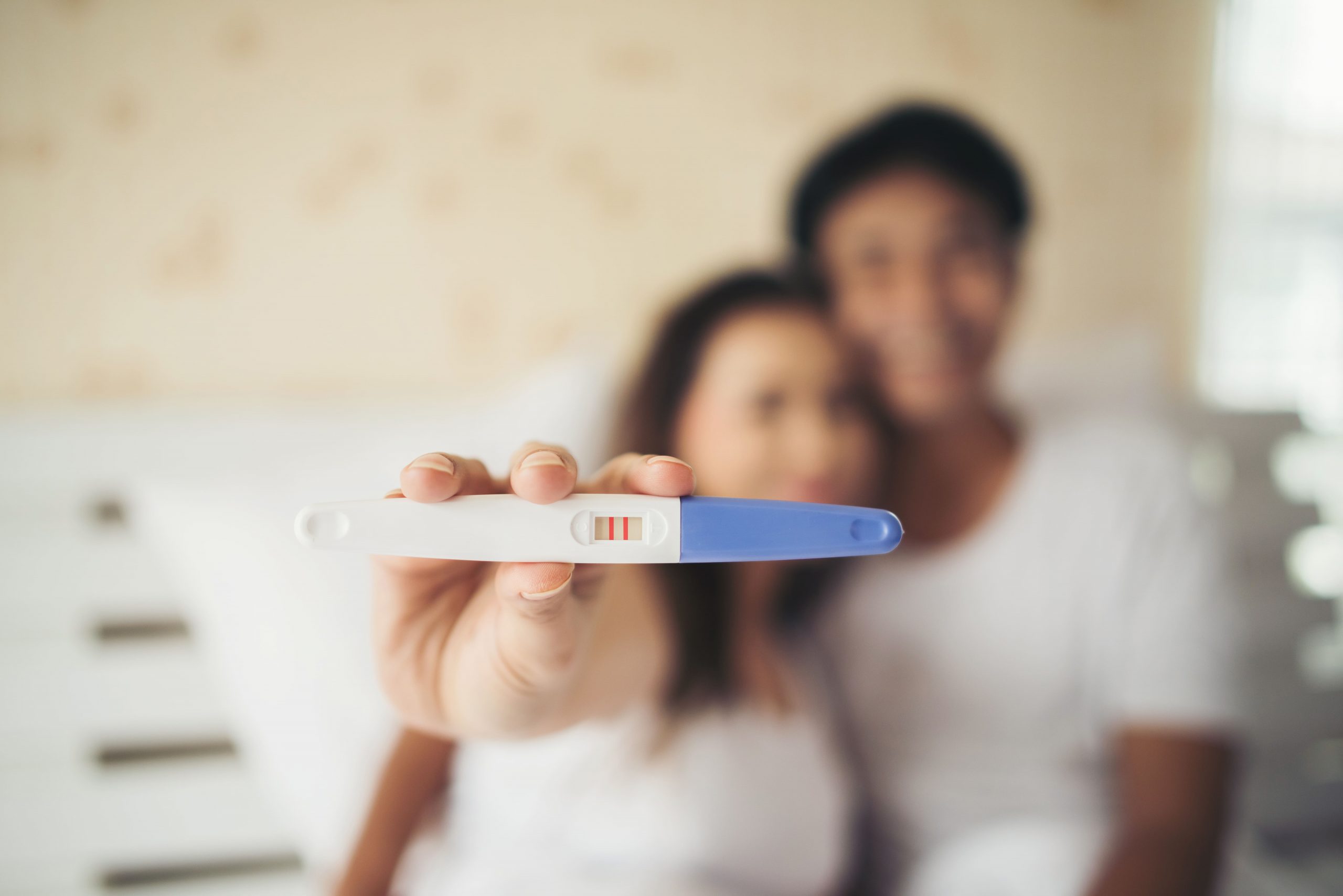 excited-new-parent-hand-show-pregnancy-test (1) – Dr. Brown's Indonesia